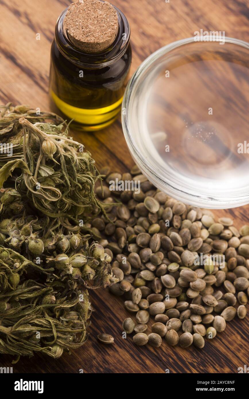 Cannabis extract with leaves Stock Photo - Alamy