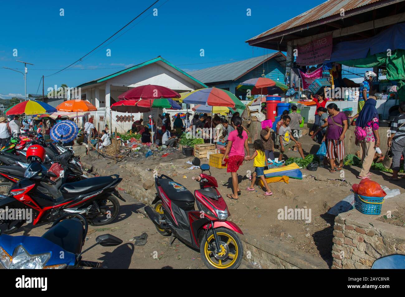 A colorful market scene at the market in Labuan Bajo, a fishing town ...