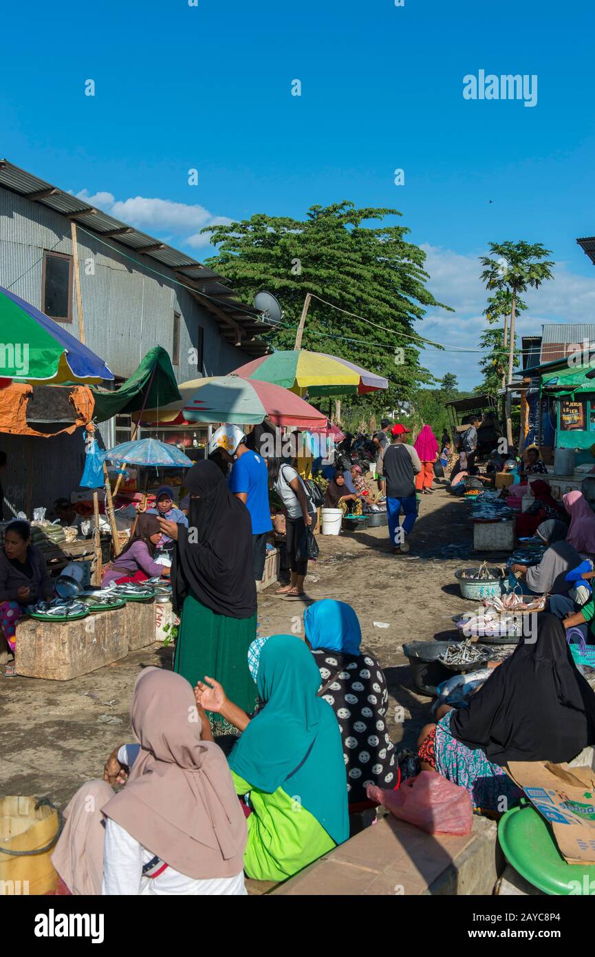 A colorful market scene at the market in Labuan Bajo, a fishing town ...
