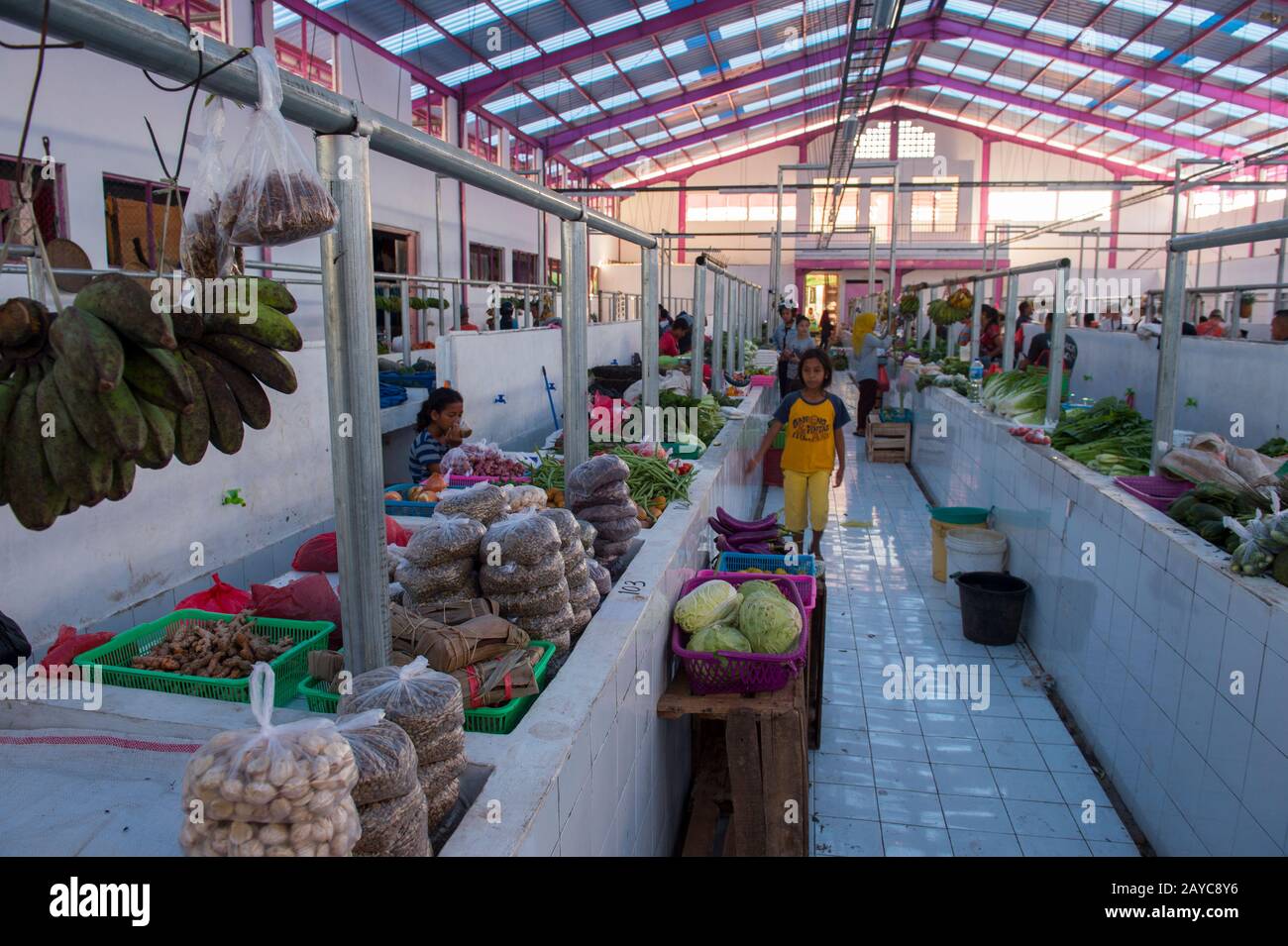 A market scene inside the market hall in Labuan Bajo, a fishing town ...