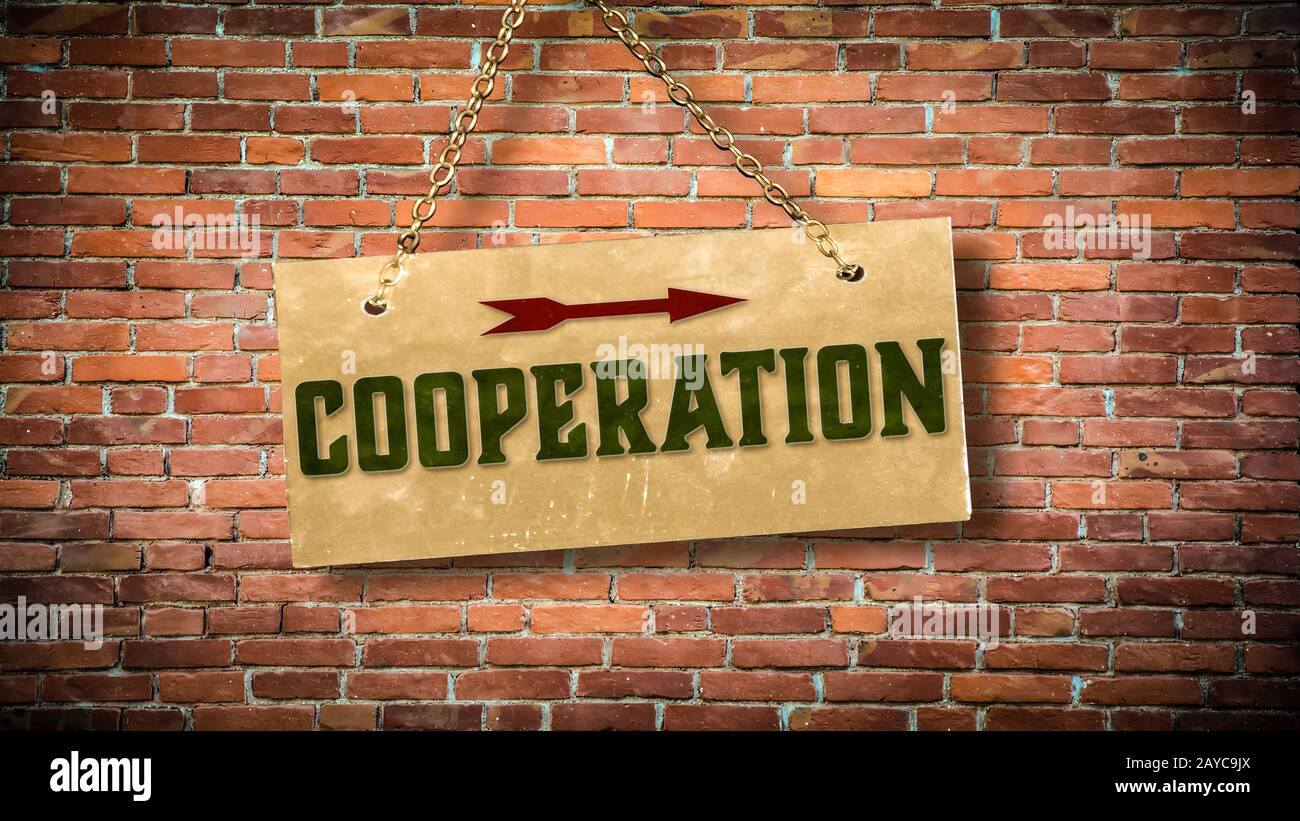 Street Sign to Cooperation Stock Photo - Alamy