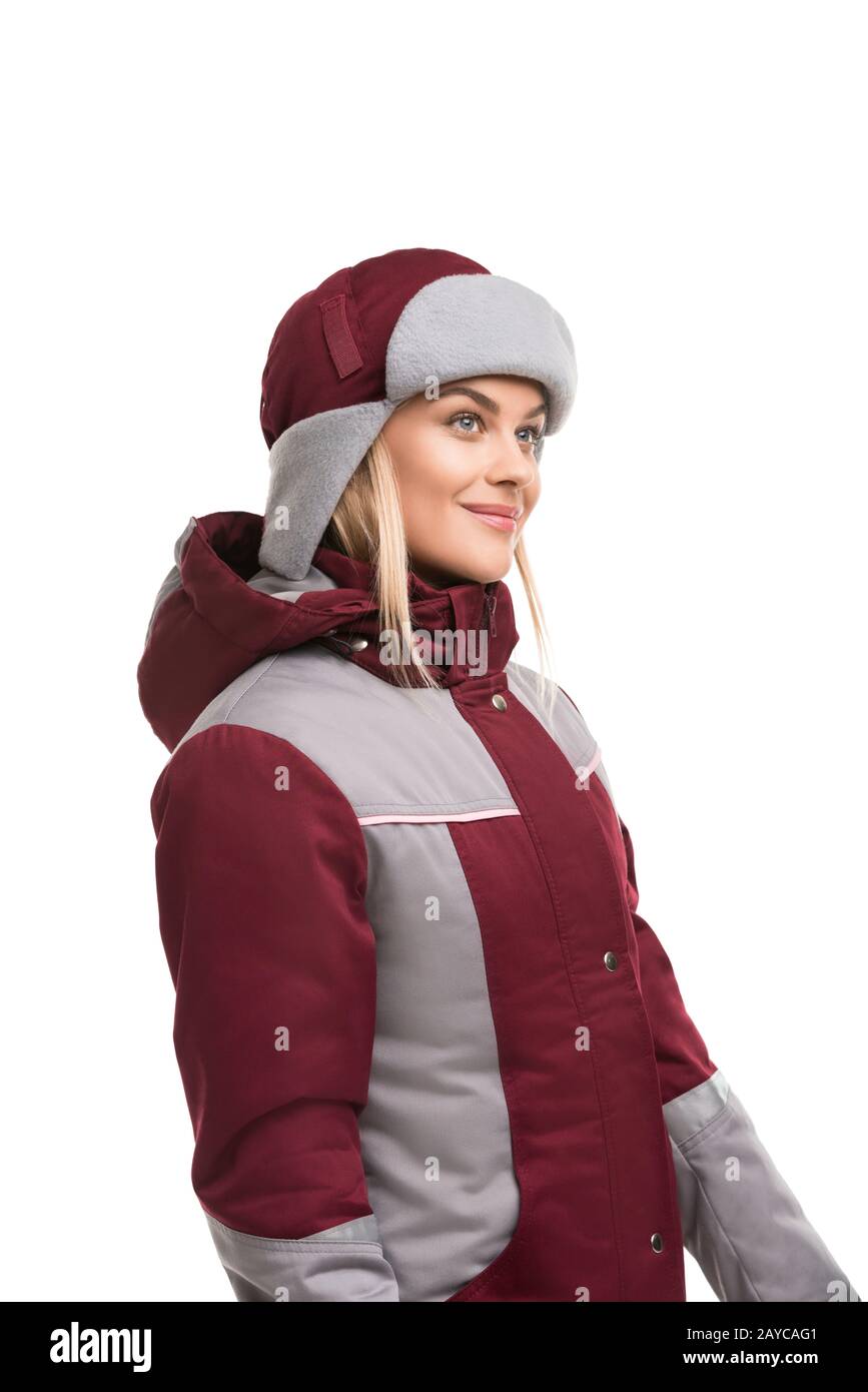 Blonde in working clothes and cap isolated view Stock Photo - Alamy