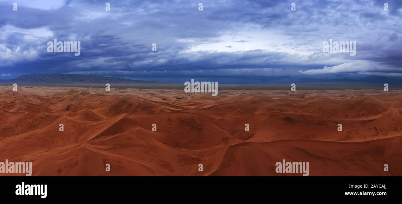Sand dunes storm clouds in Gobi Desert Stock Photo - Alamy