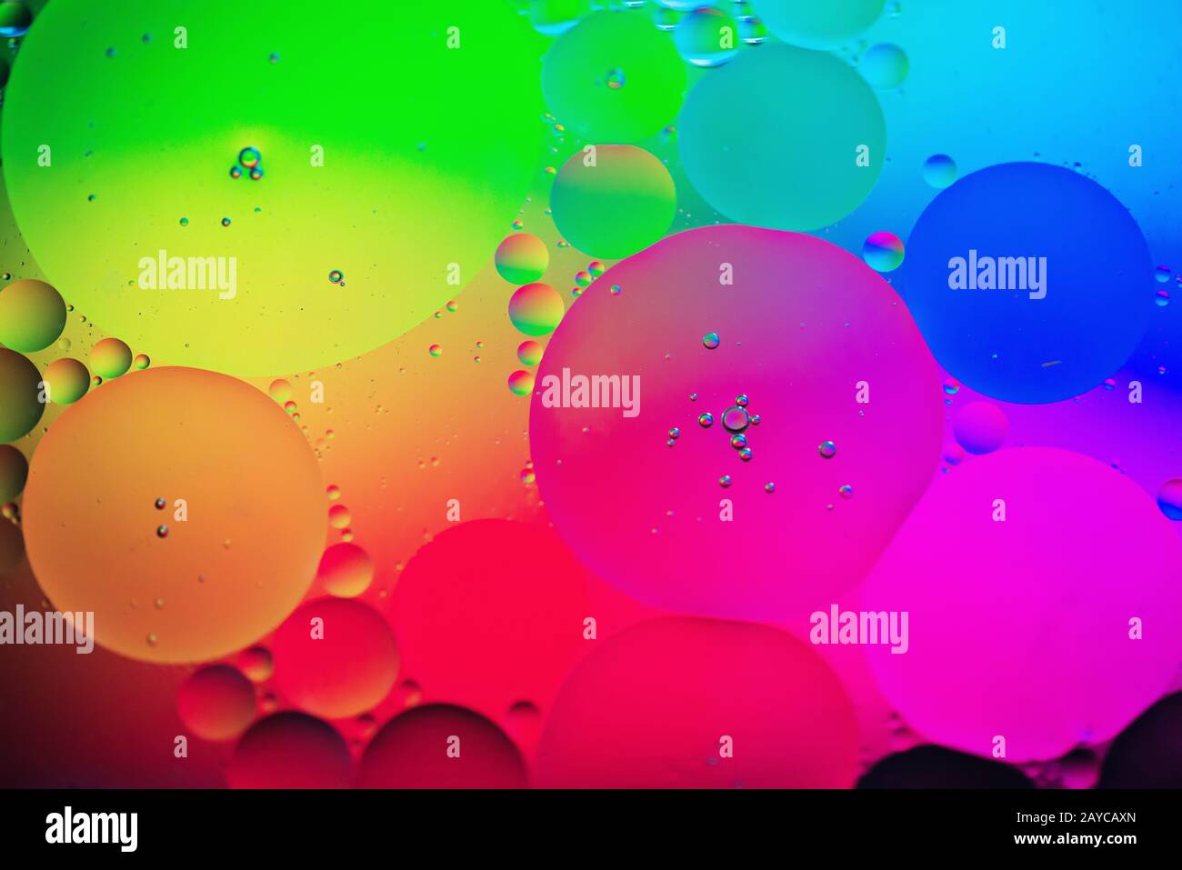 Oil rainbow water hi-res stock photography and images - Alamy