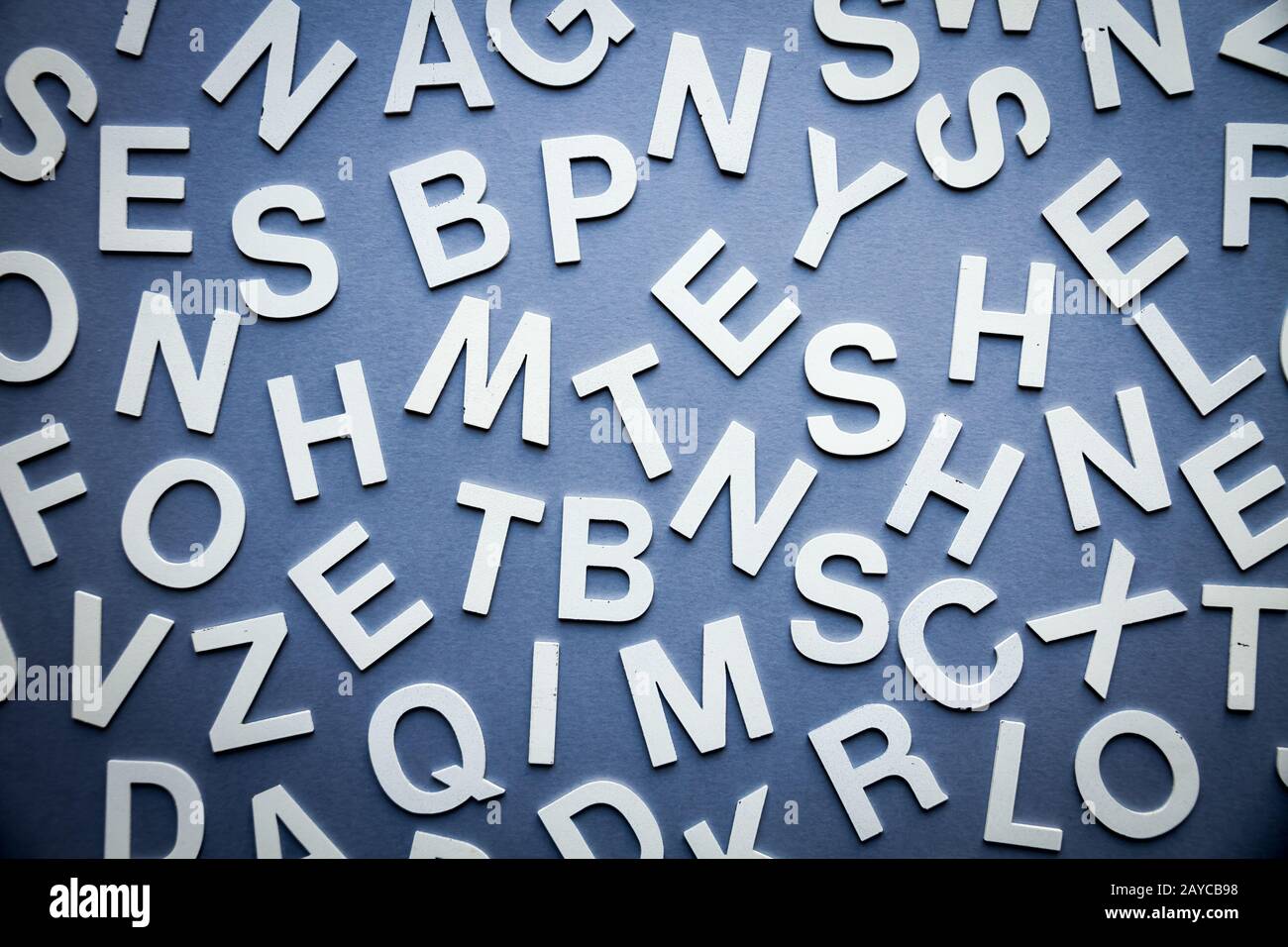 Mixed letters pile top view photo Stock Photo - Alamy