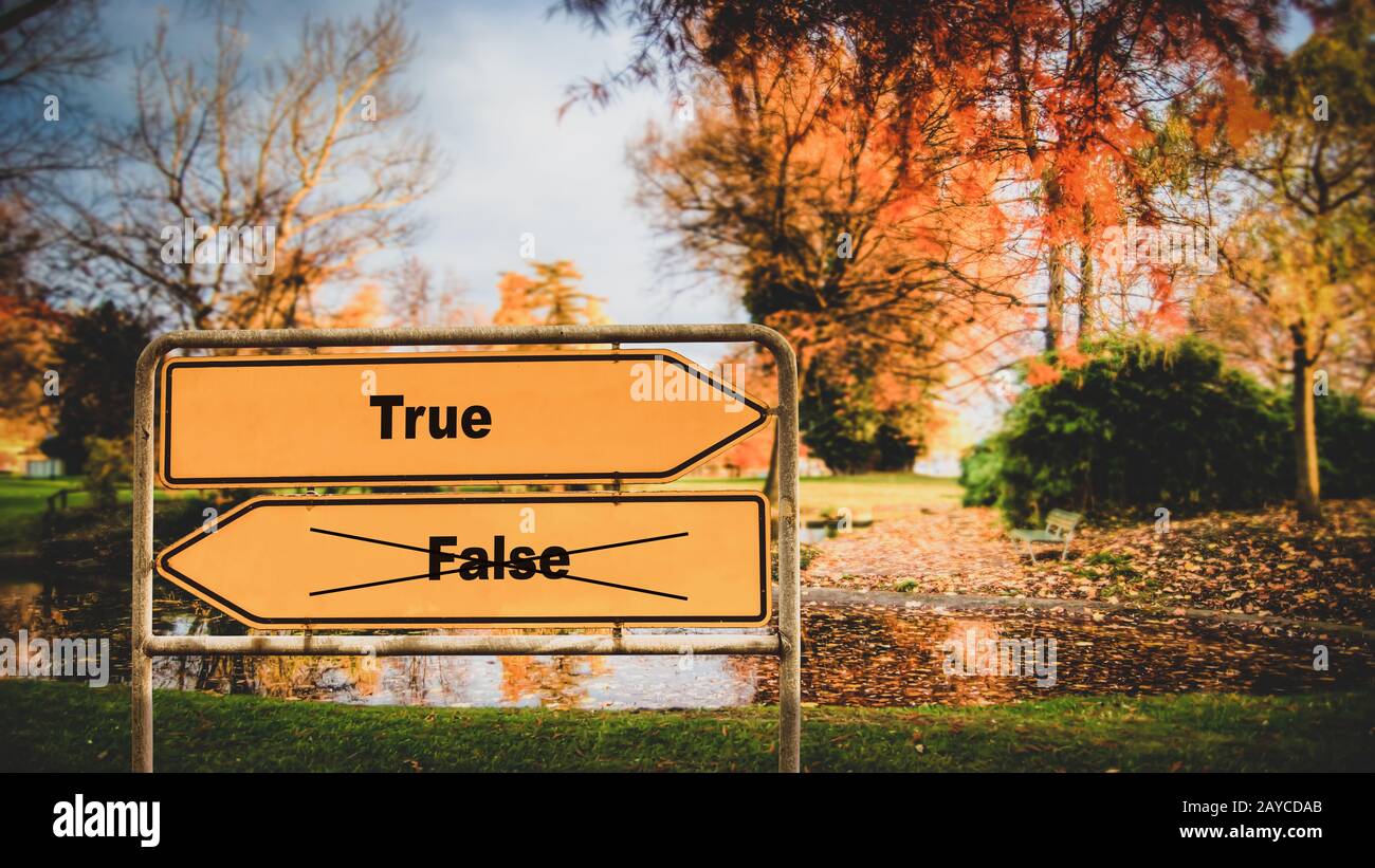 Street Sign True versus False Stock Photo - Alamy