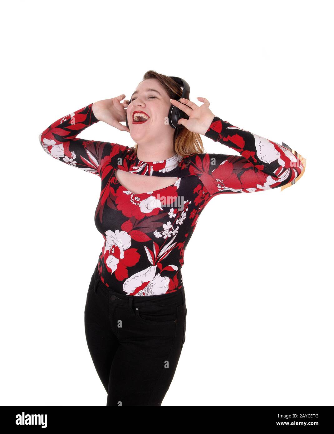 Woman listening to music with headset Stock Photo - Alamy