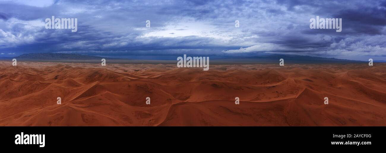 Sand dunes storm clouds in Gobi Desert Stock Photo - Alamy