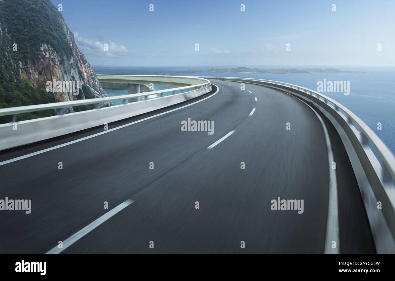 Highway overpass motion blur with coast skyline background Stock Photo ...