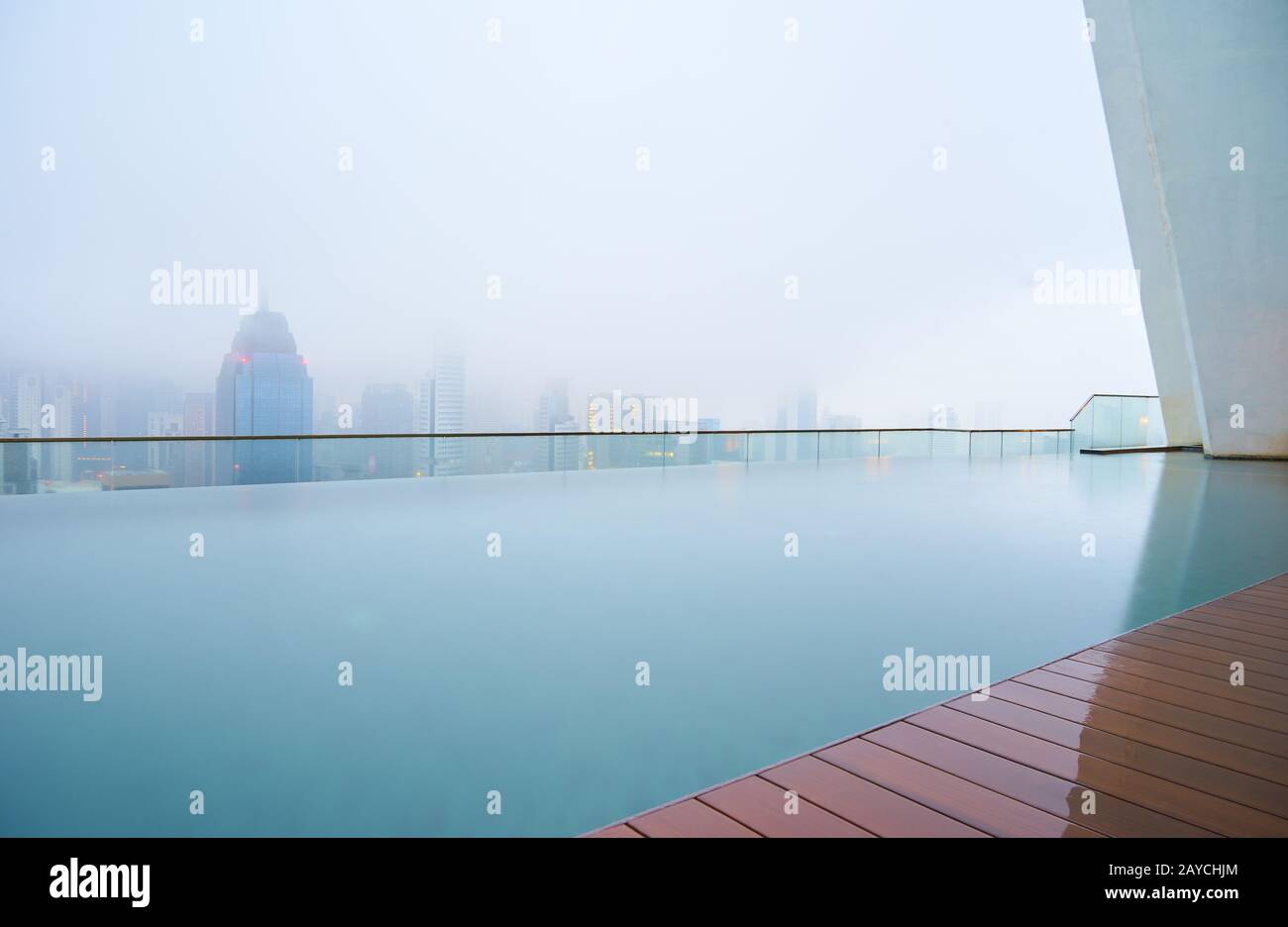 Swimming pool on roof top with beautiful city skyline view Stock Photo ...