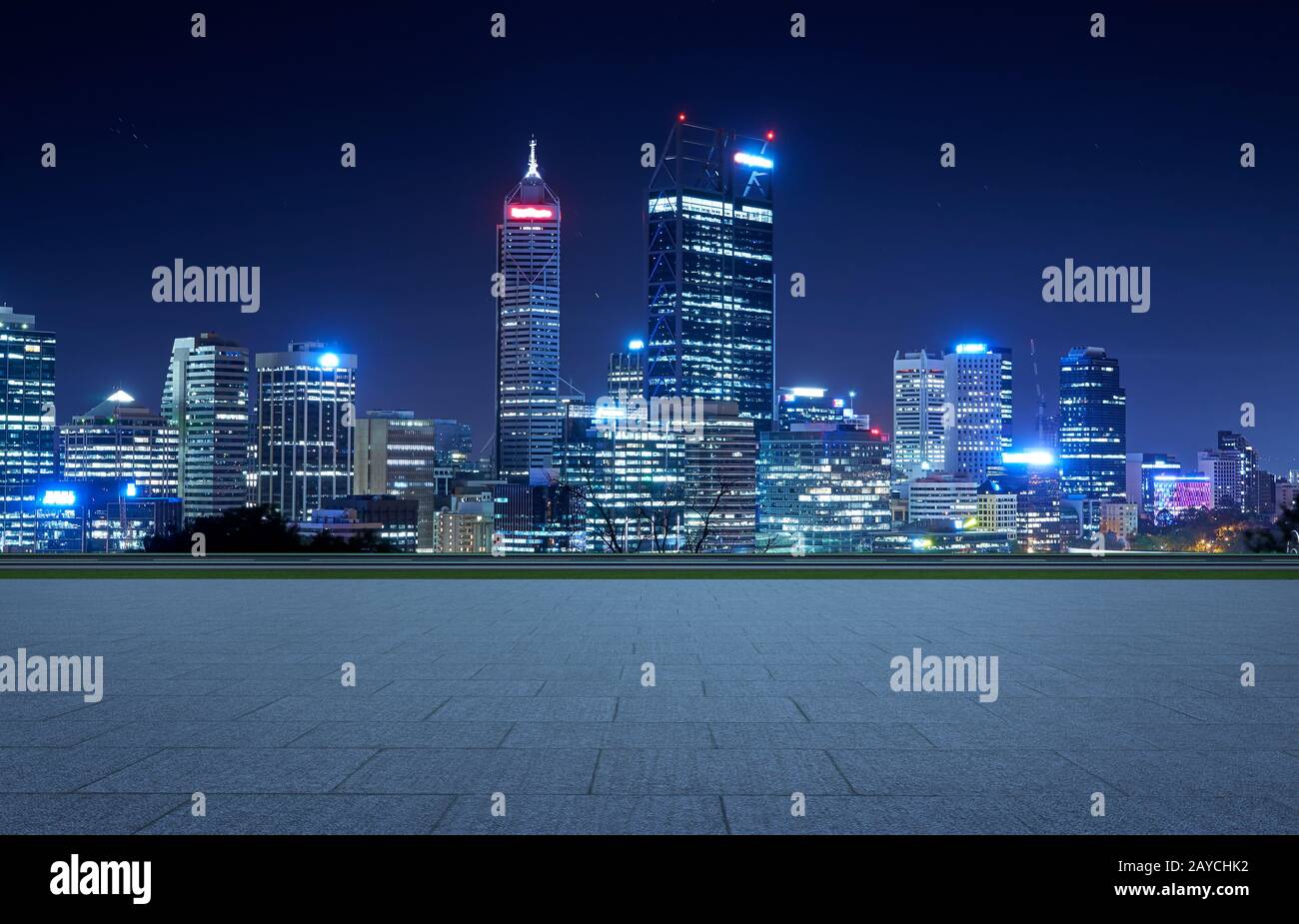 Empty square ground floor with city skyline background . Night scene ...