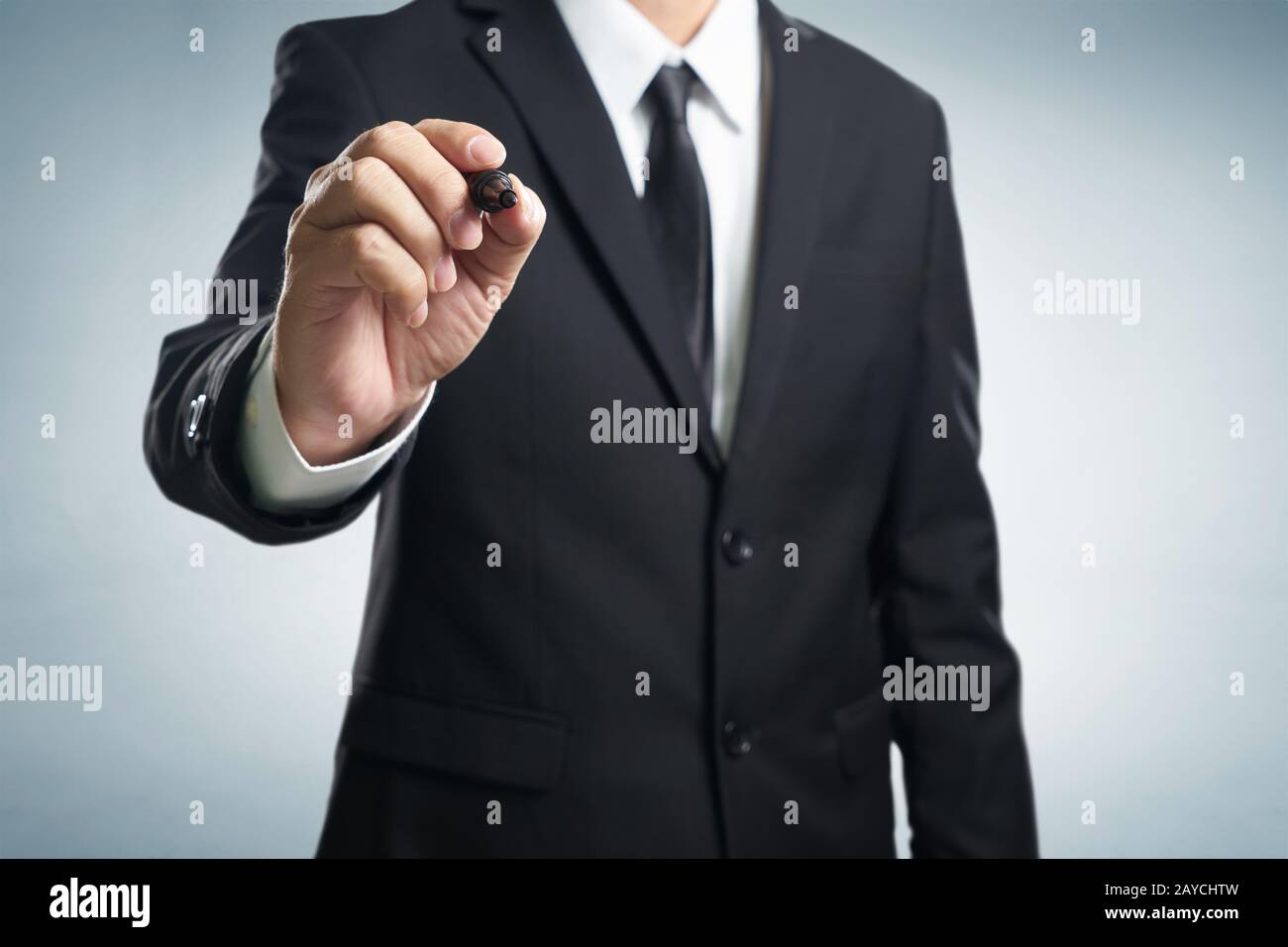 Businessman writing hi-res stock photography and images - Alamy
