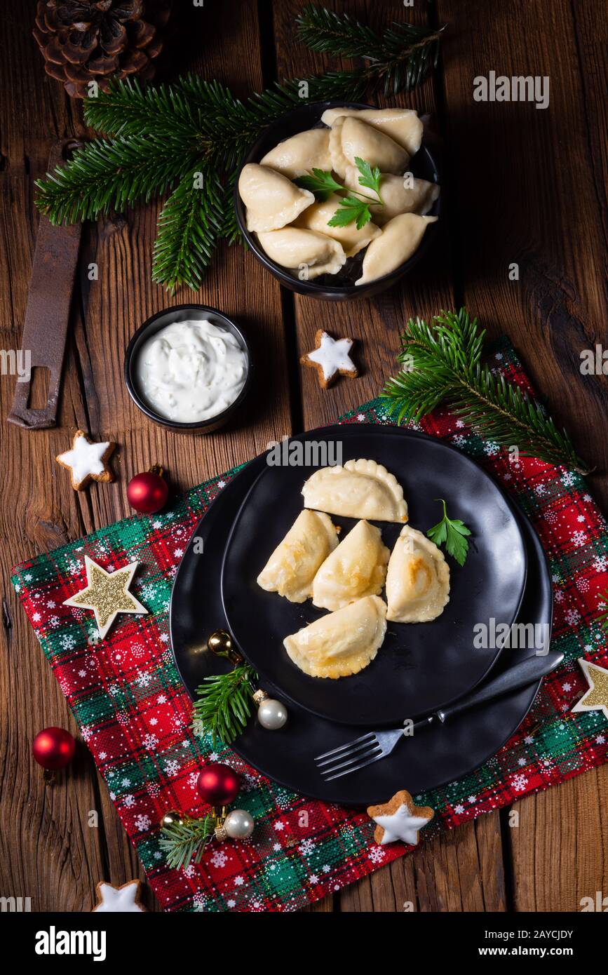 Polish Christmas pierogi with sauerkraut and mushrooms Stock Photo - Alamy