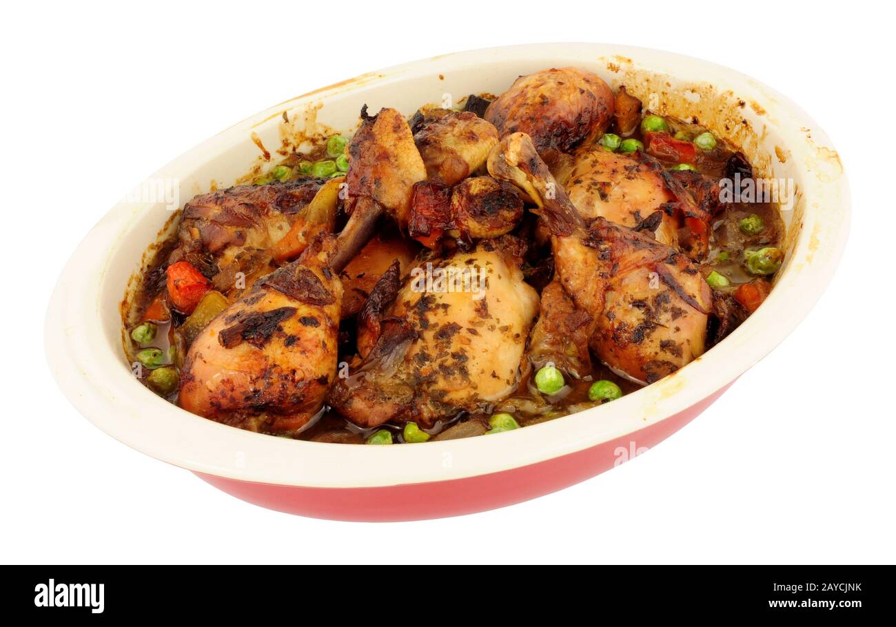 Chicken casserole in oven dish isolated on white background Stock Photo ...