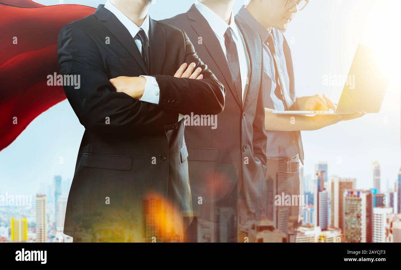 Superhero businessman team standing together Stock Photo - Alamy