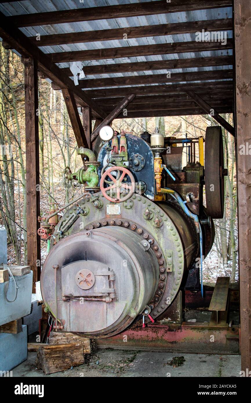 This is an old steam engine for operating machines of a sawmill Stock ...