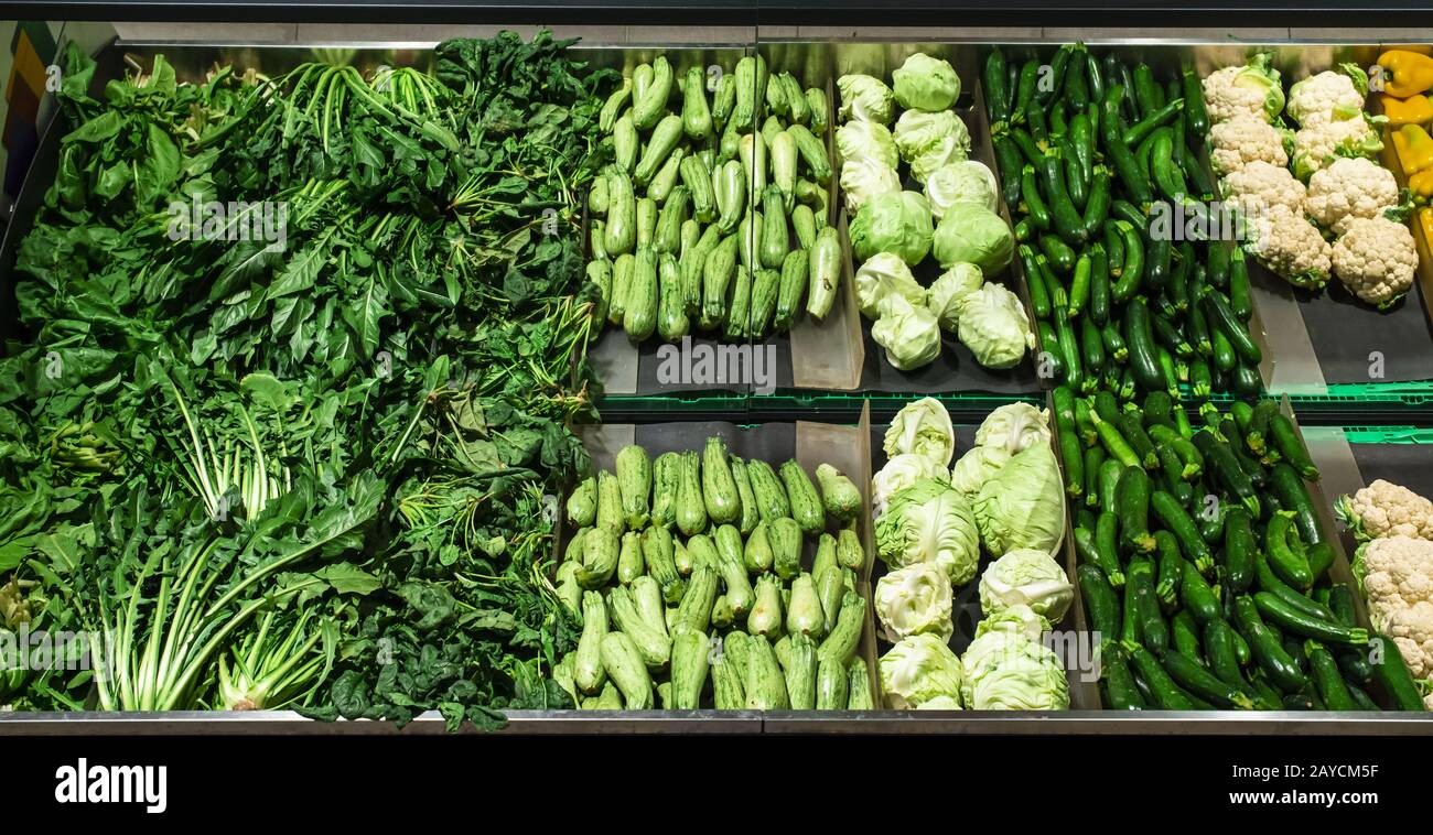 Vegetables on shelf in supermarket Stock Photo - Alamy