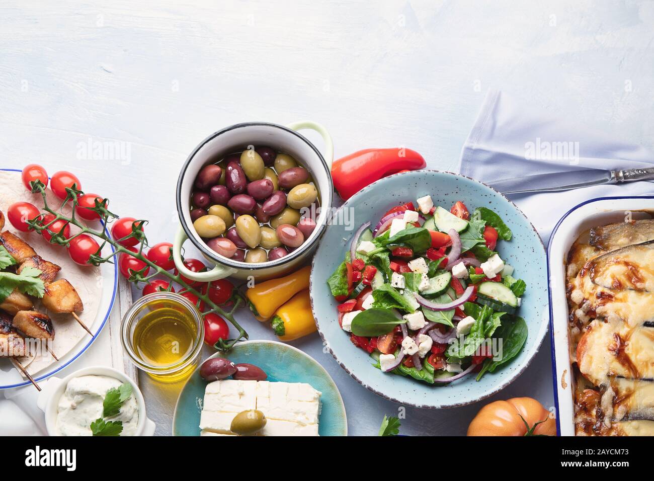 Greek food. Moussaka, meze, souvlaki, fish, pita, greek salad, tzatziki ...