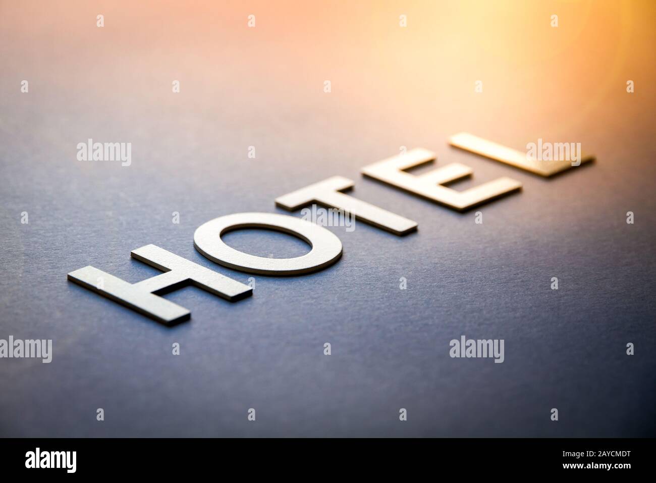 Word hotel written with white solid letters Stock Photo - Alamy