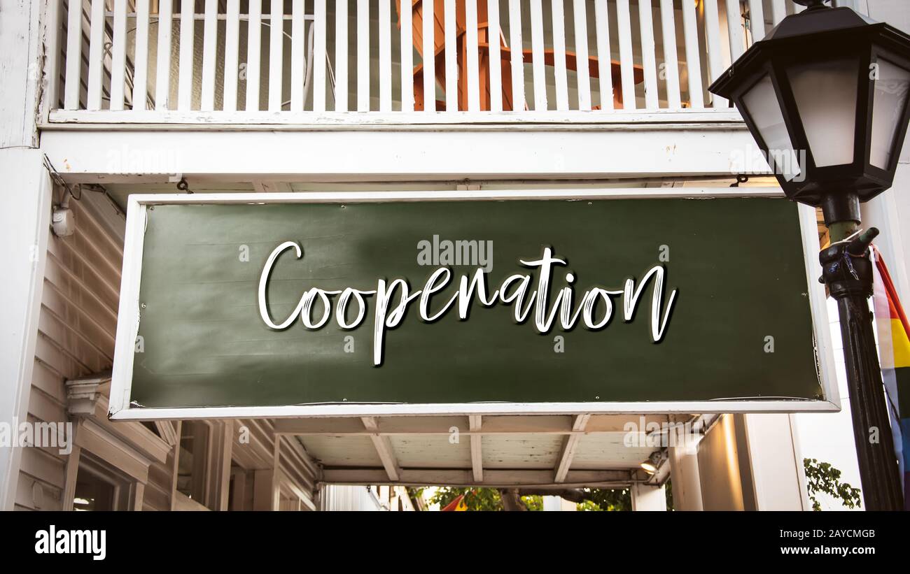 Street Sign to Cooperation Stock Photo - Alamy
