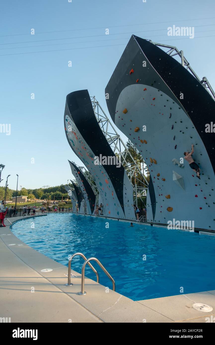 Person climbing over wall hi-res stock photography and images - Alamy