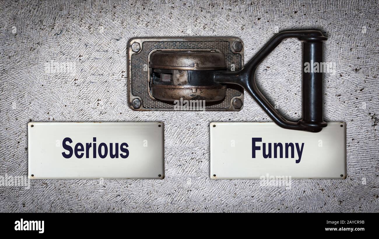 Wall Switch Funny versus Serious Stock Photo - Alamy