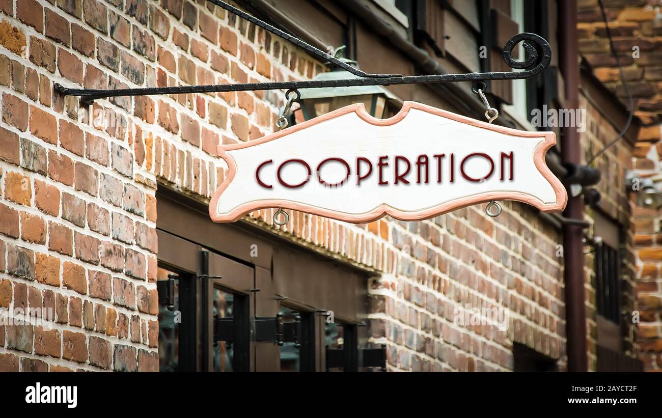Street Sign to Cooperation Stock Photo - Alamy