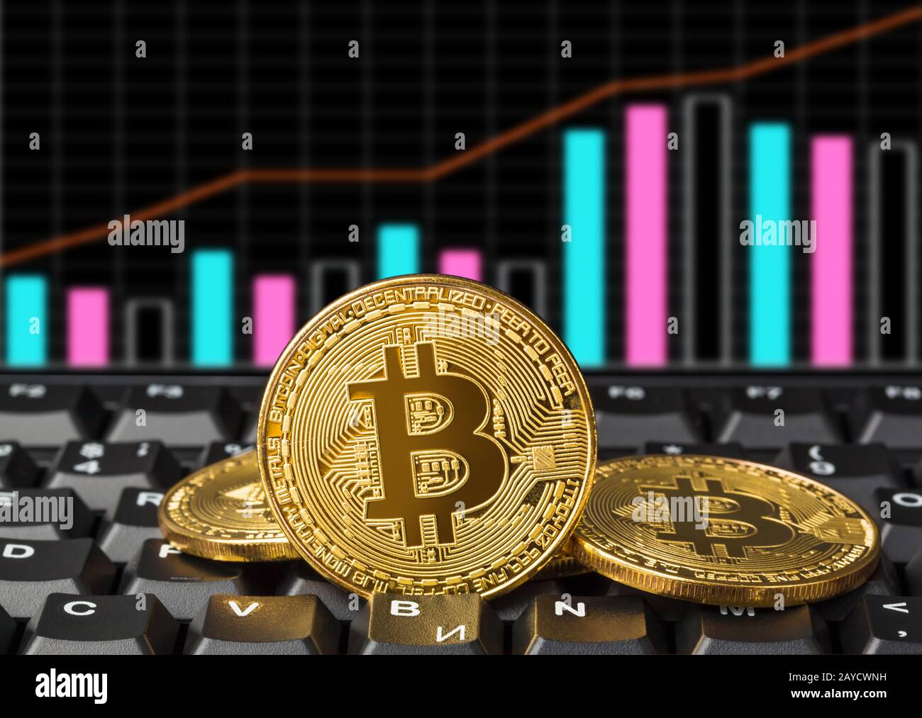 Bitcoins on computer and diagram - business background Stock Photo - Alamy