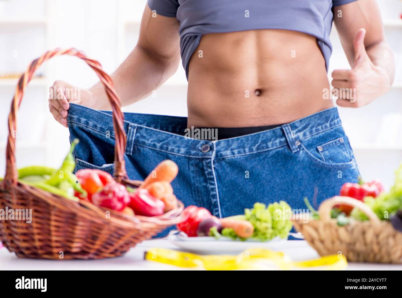 The young man in healthy eating and dieting concept Stock Photo - Alamy
