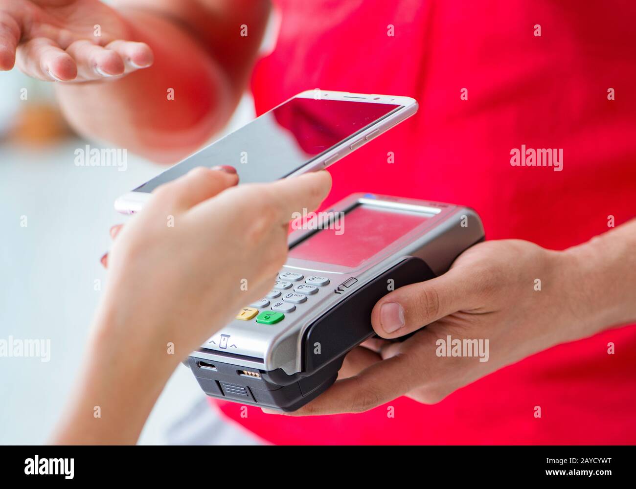 Concept of paying with POS terminal Stock Photo - Alamy