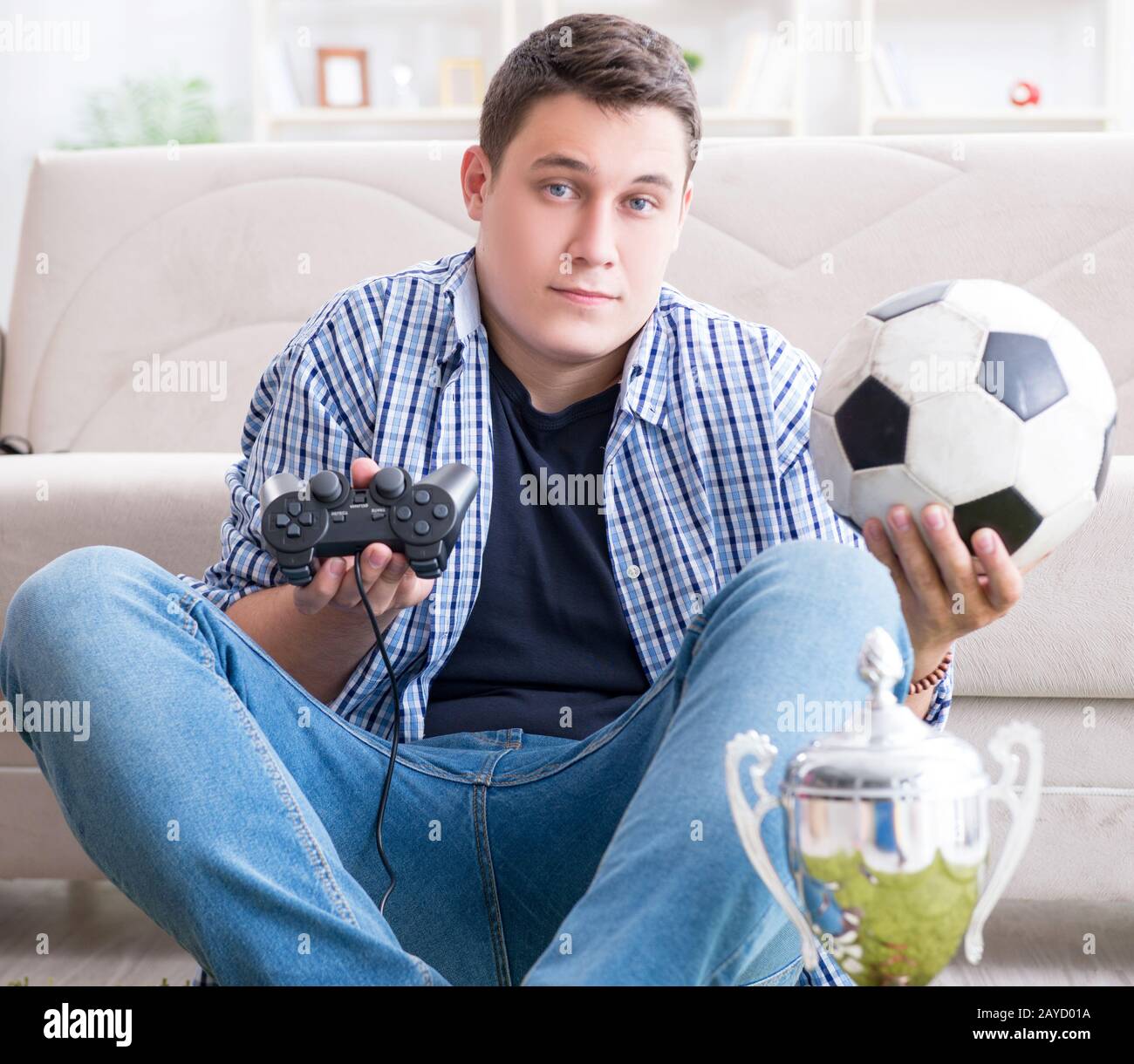 Young man playing computer games at home Stock Photo - Alamy