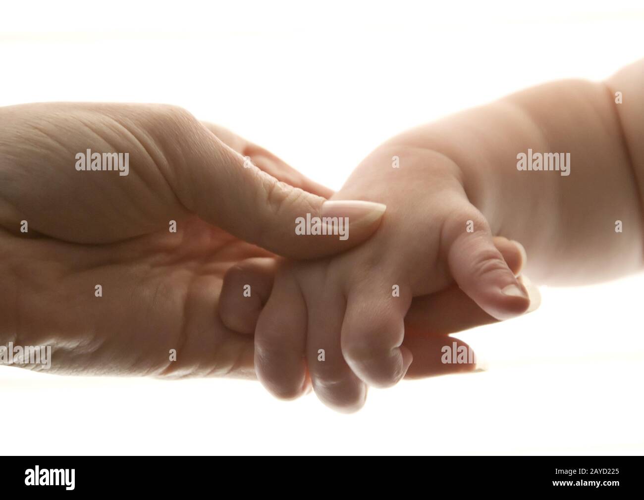 Baby hand and mom hand Stock Photo - Alamy