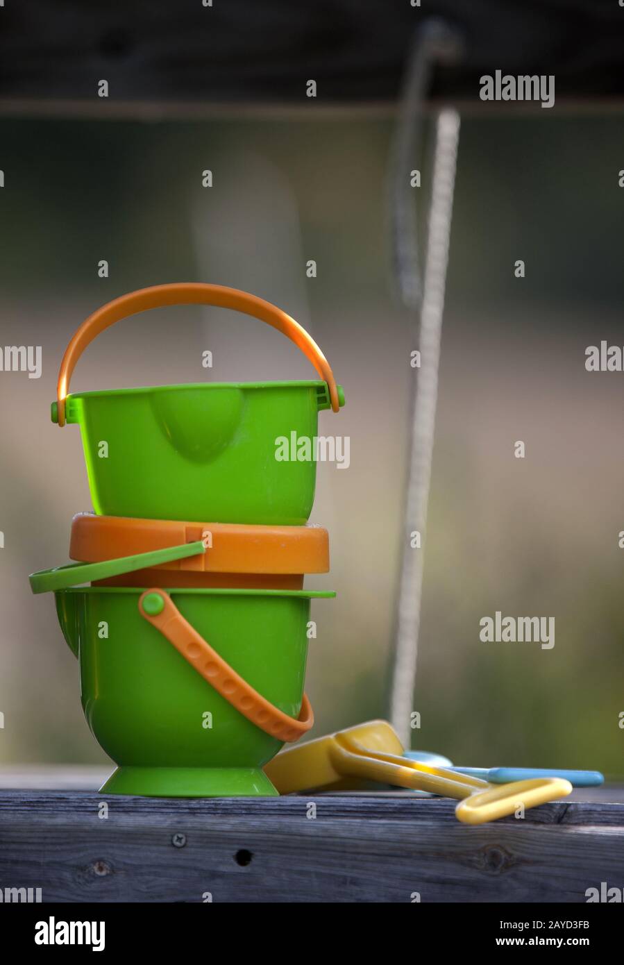 Childrens sandbox pails Stock Photo - Alamy