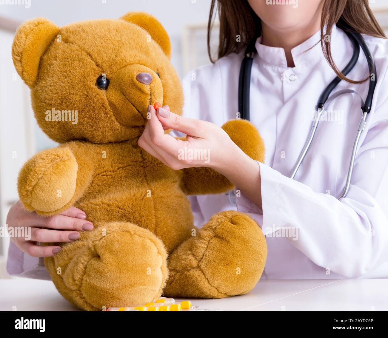Child checking soft toy health Stock Photo - Alamy