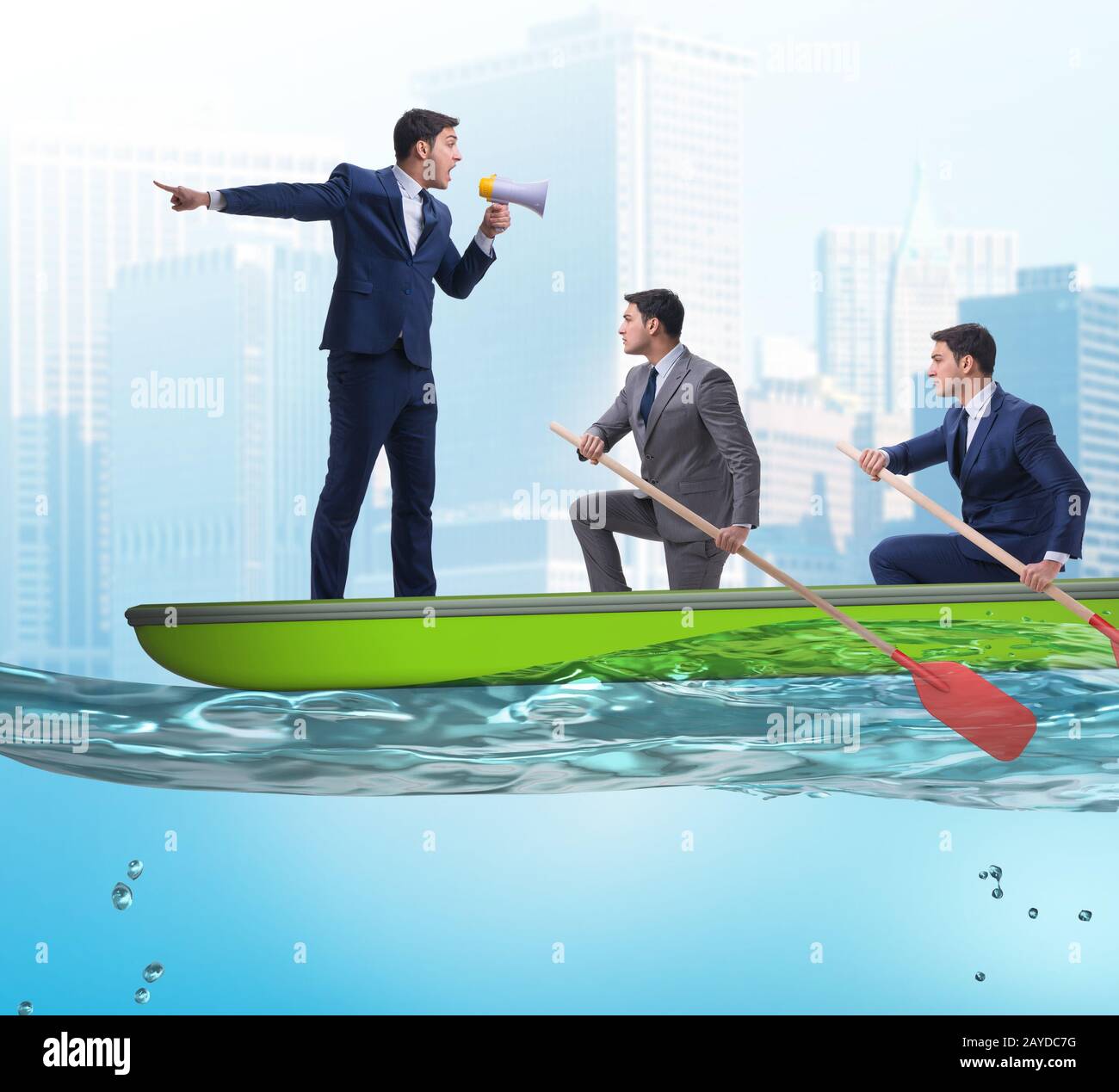 The team of businessmen in teamwork concept with boat Stock Photo - Alamy