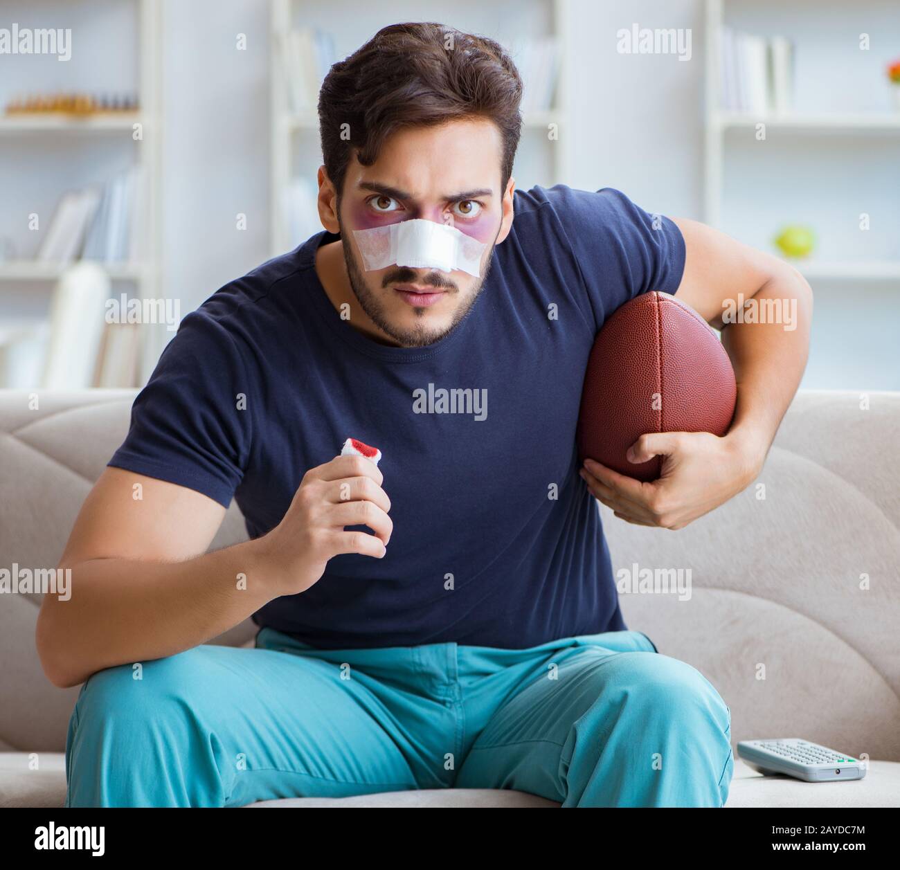 Young man defeated in sports game suffered loss with broken blee Stock ...