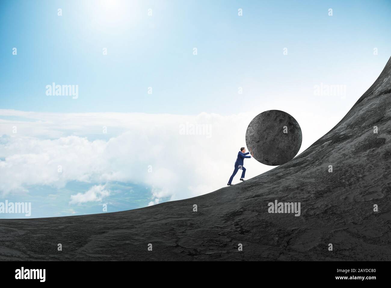 Pushing rock up hill hi-res stock photography and images - Alamy