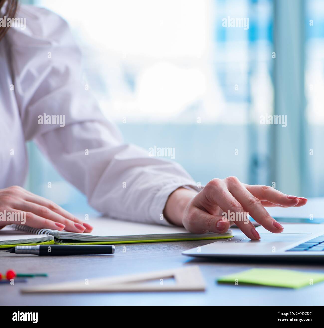 Woman hands working on computer at desk Stock Photo - Alamy