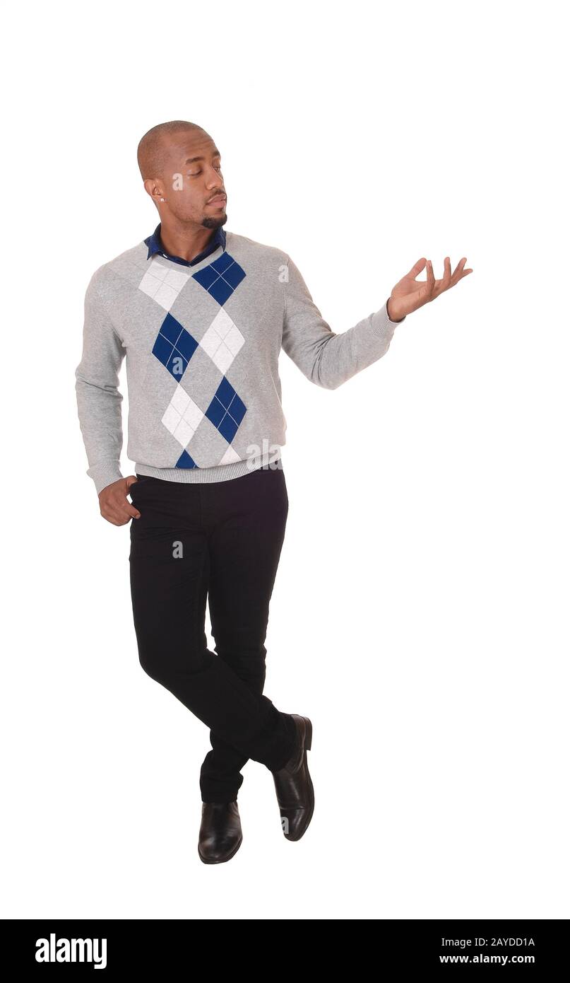 An African man standing and pointing with his hand Stock Photo - Alamy
