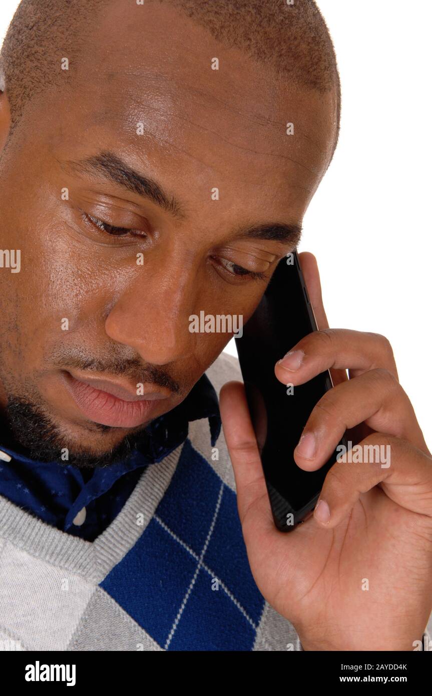 Close-up image of an African man on his cellphone Stock Photo - Alamy