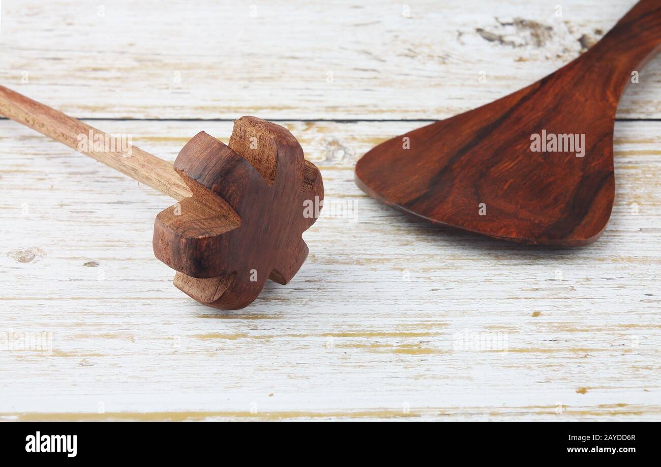 Indian made Kitchen wooden spatula and butter churner Stock Photo - Alamy