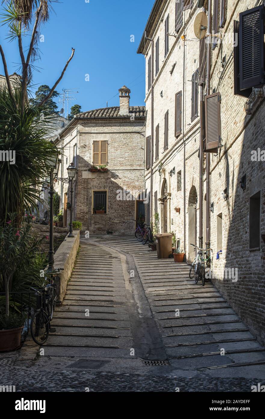 Old buildings on small italian street. Narrow street in Italy Stock ...