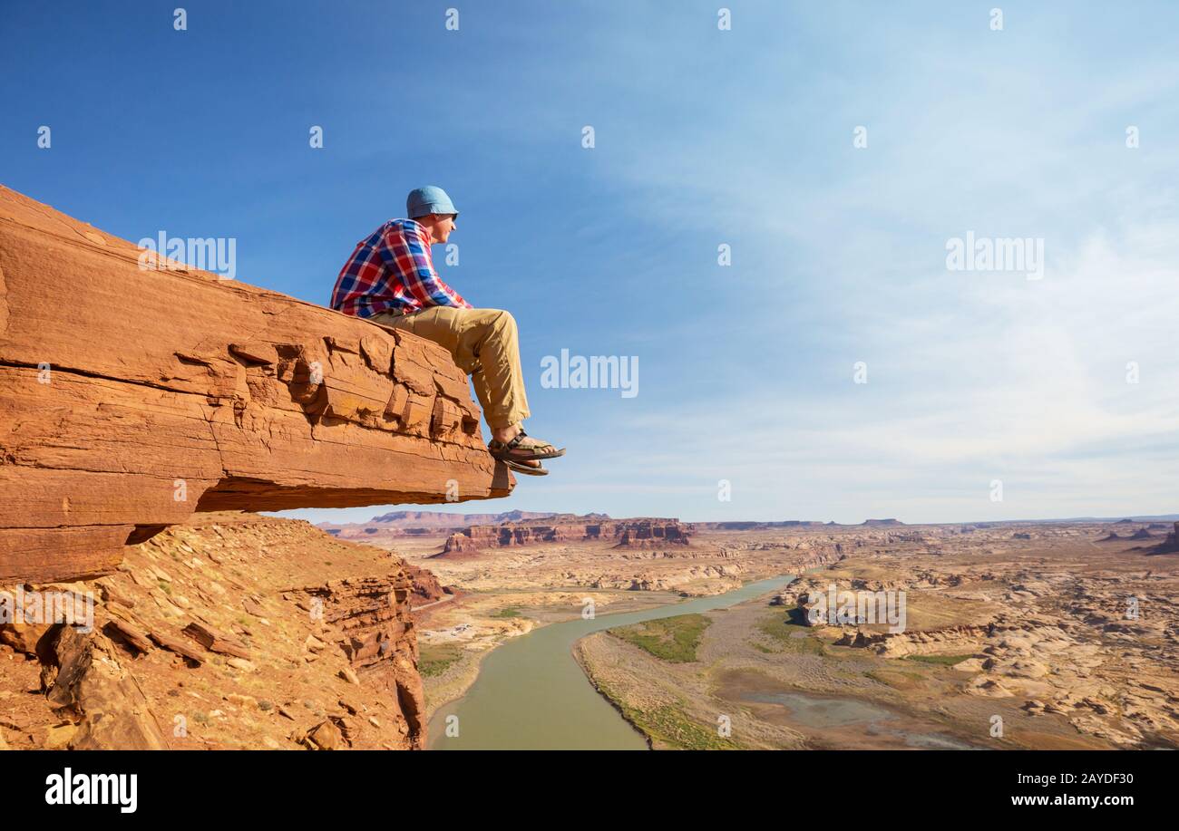 Man on the cliff Stock Photo - Alamy