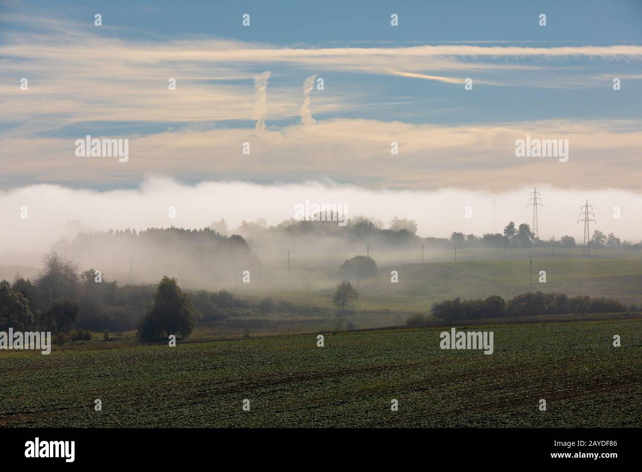 Fall foggy and misty sunrise landscape Stock Photo - Alamy