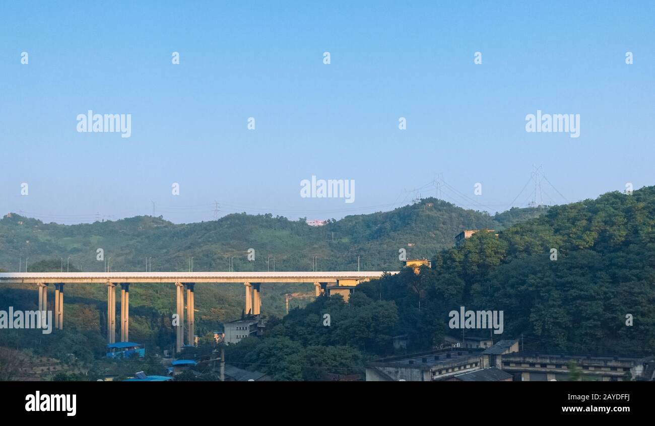 viaduct. Railway bridge between two mountains. Railway viaduct. Sky and ...