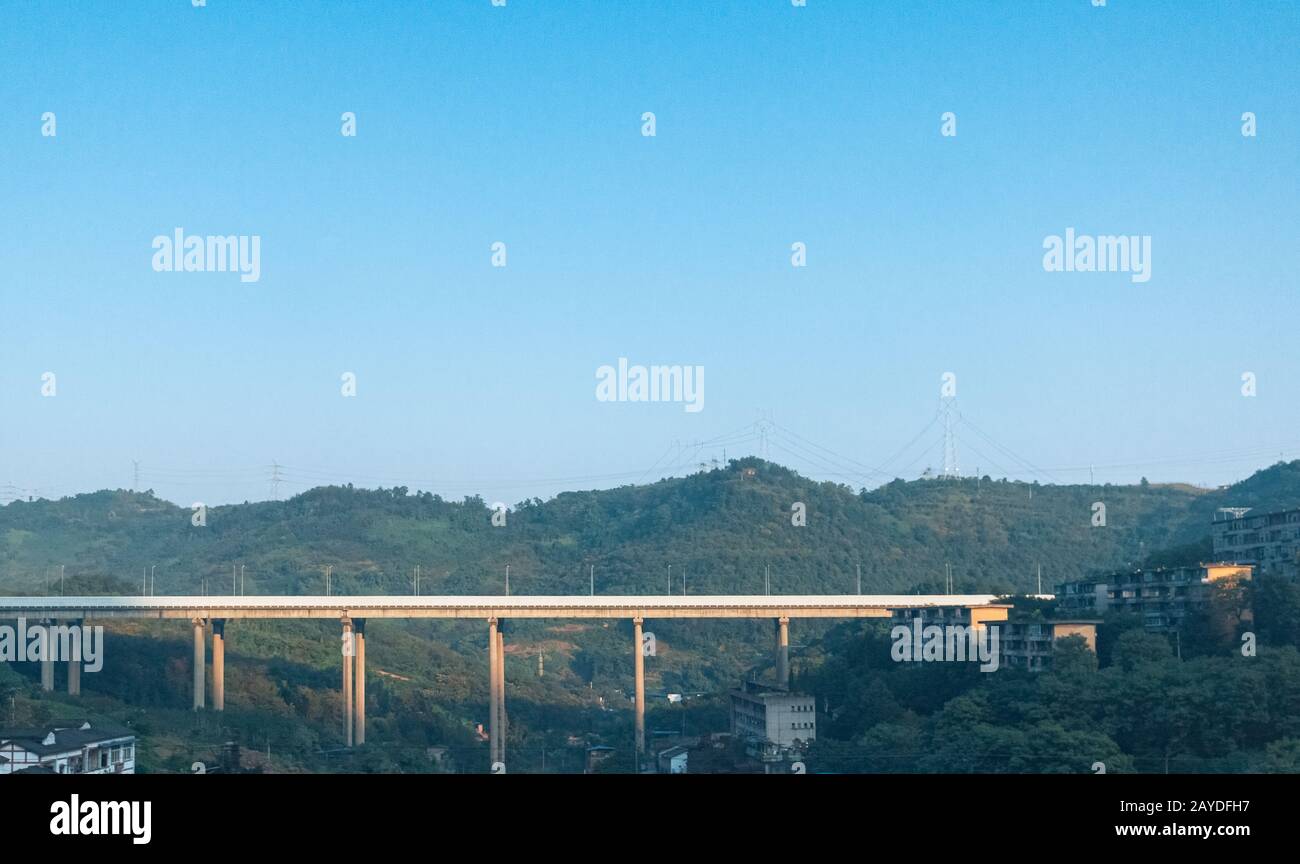 viaduct. Railway bridge between two mountains. Railway viaduct. Sky and ...