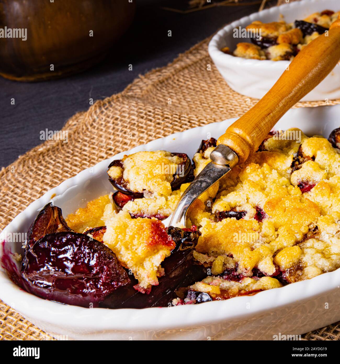 Cinnamon prunes with crumble Stock Photo - Alamy