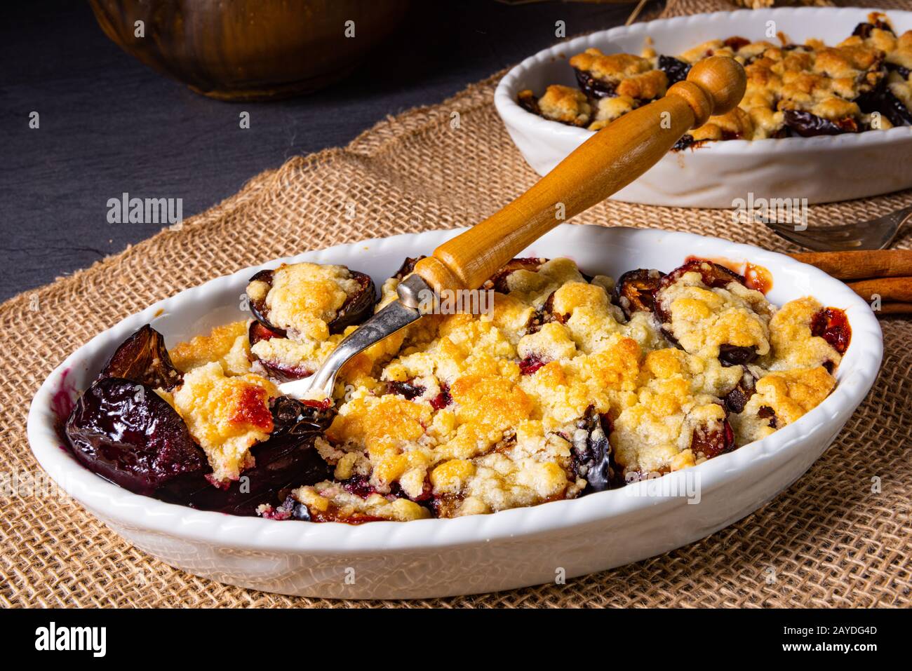 Cinnamon prunes with crumble Stock Photo - Alamy