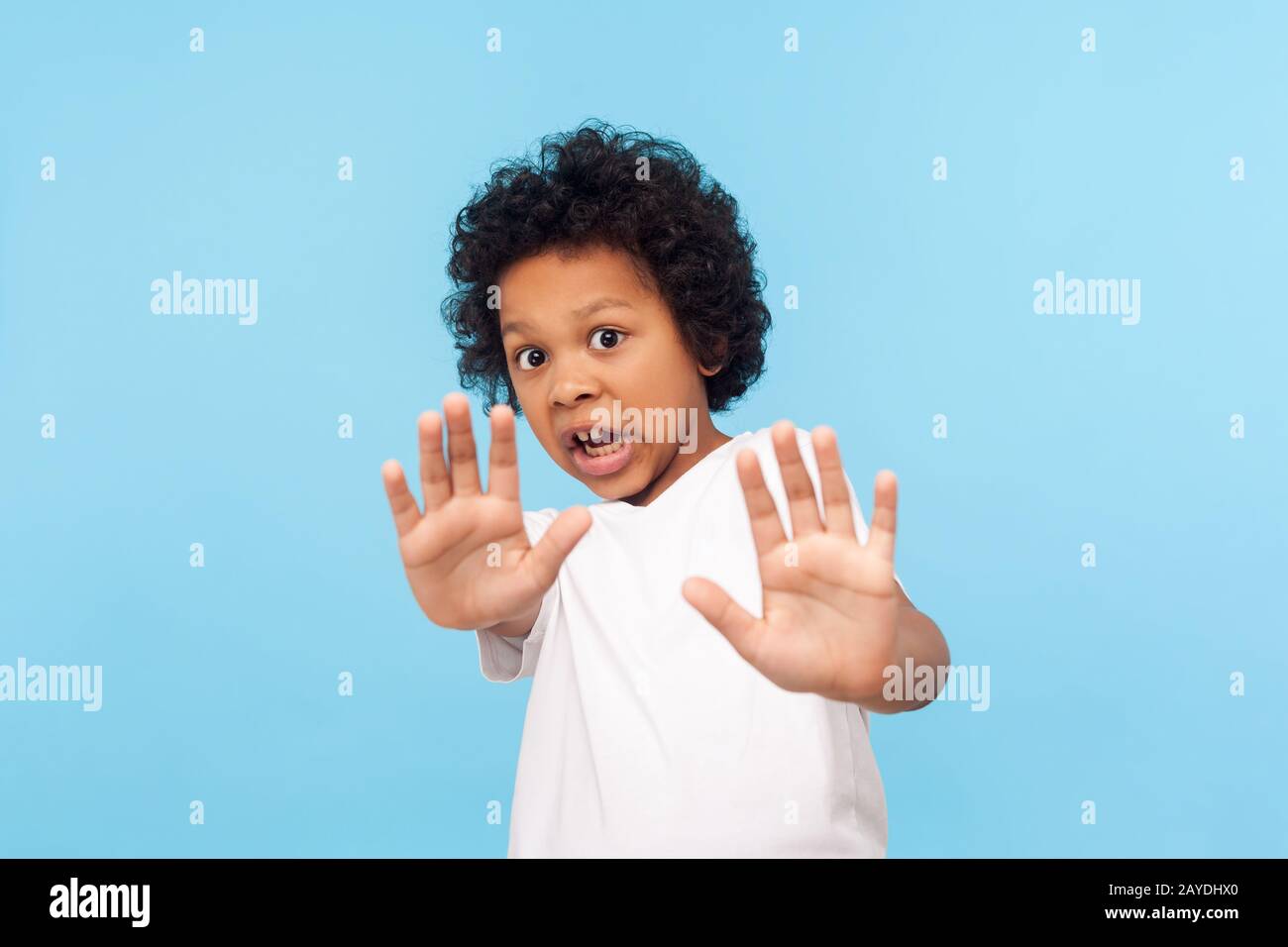 Child phobia. Portrait of scared little boy looking terrified panicked ...