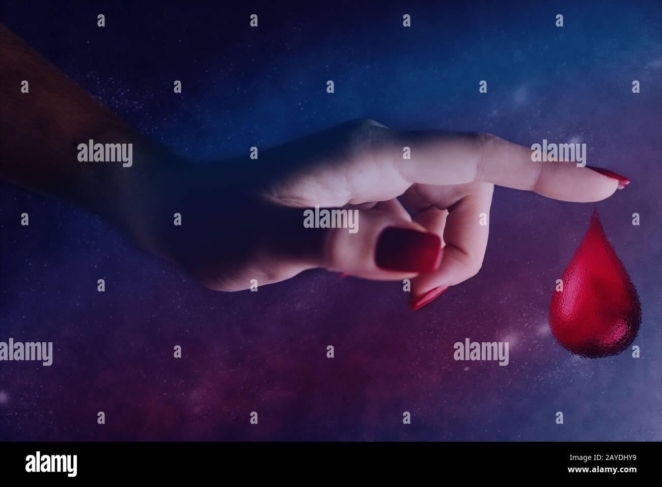 Human hand blood drop. Nebula dust in infinite space. World Blood Donor ...